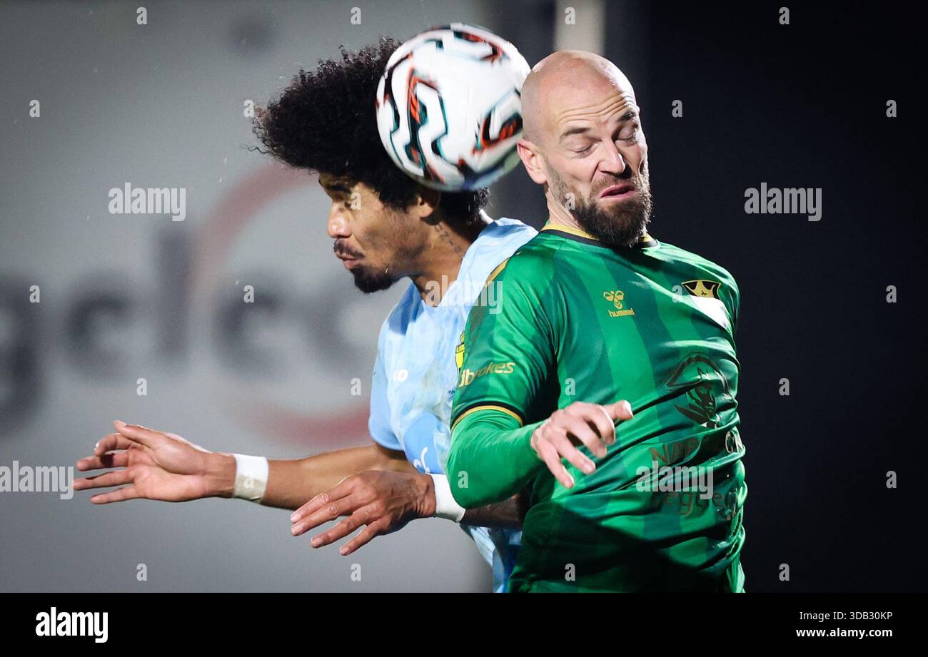 Lierse's Bryan Adinany and Francs Borains' Dorian Dessoleil fight for ...