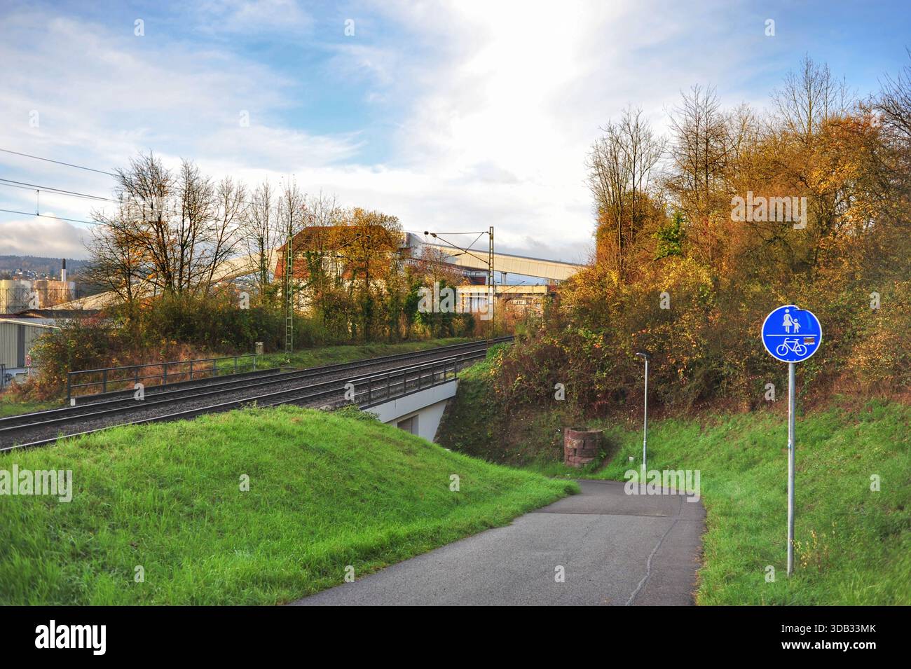 Bike Path Beside Railway Under Clouds Blue Bicycle Sign Marking Safe ...
