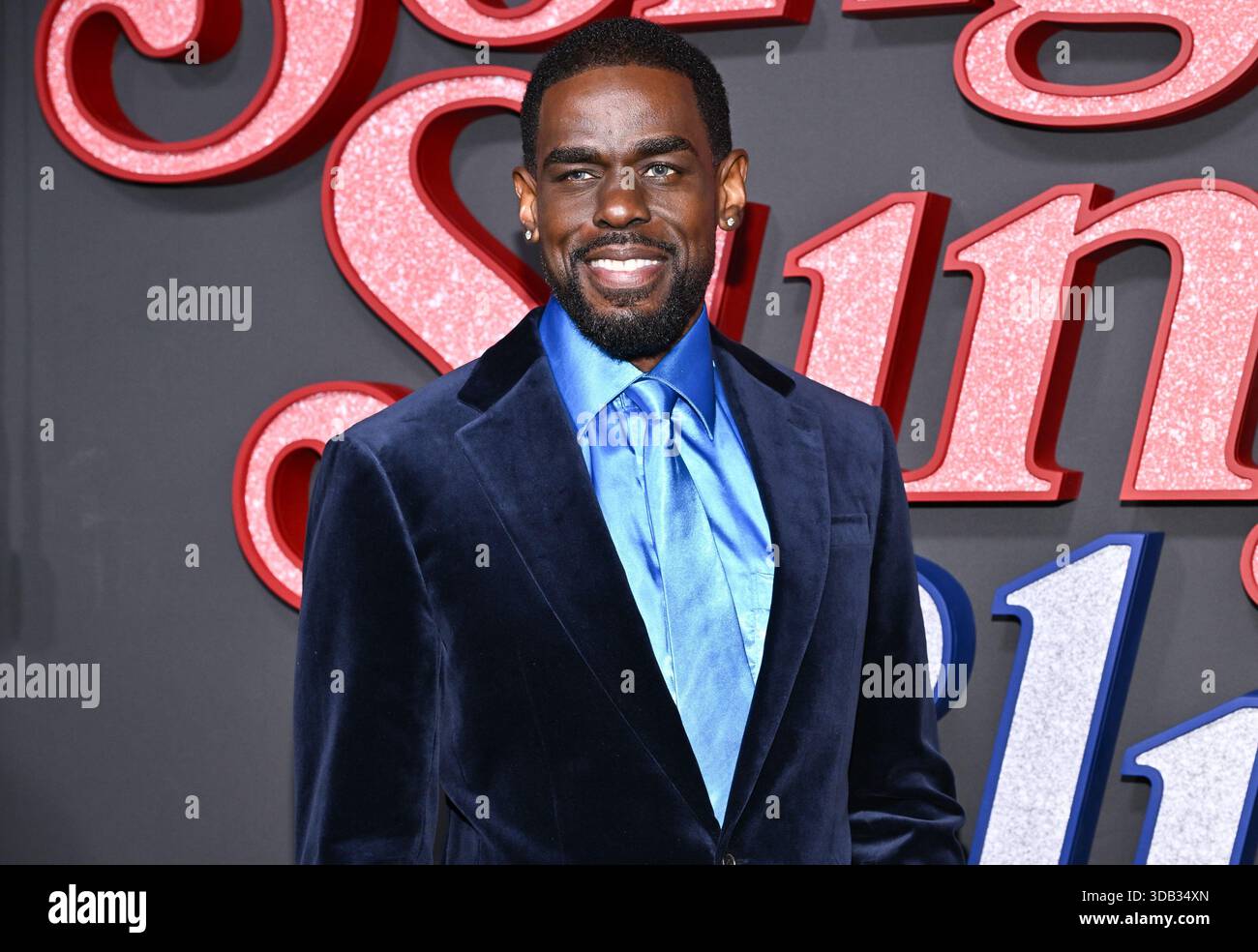 Mustafa Shakir attends the premiere of "Song Sung Blue" at AMC Lincoln ...