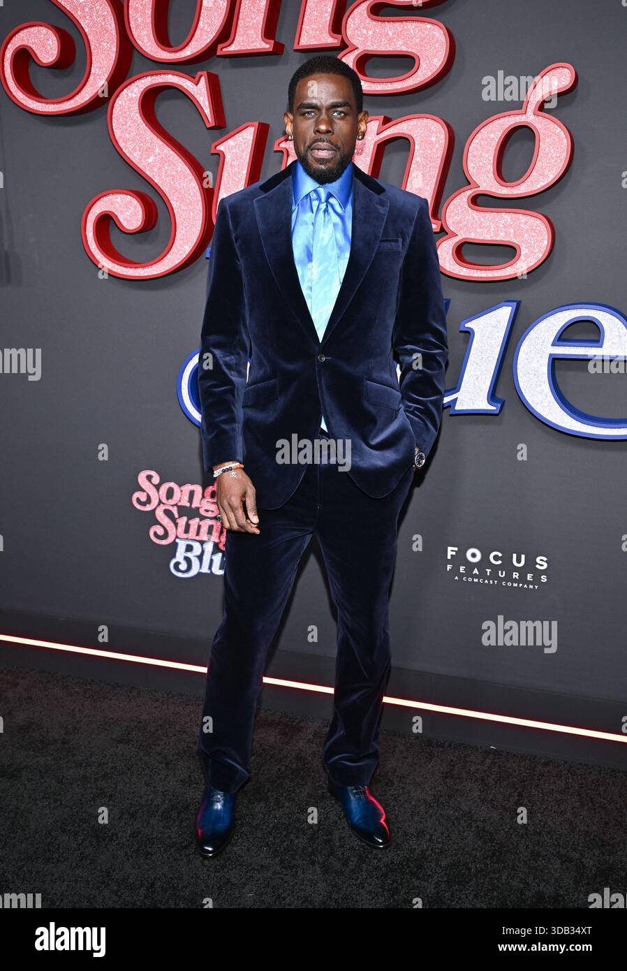 Mustafa Shakir attends the premiere of "Song Sung Blue" at AMC Lincoln ...