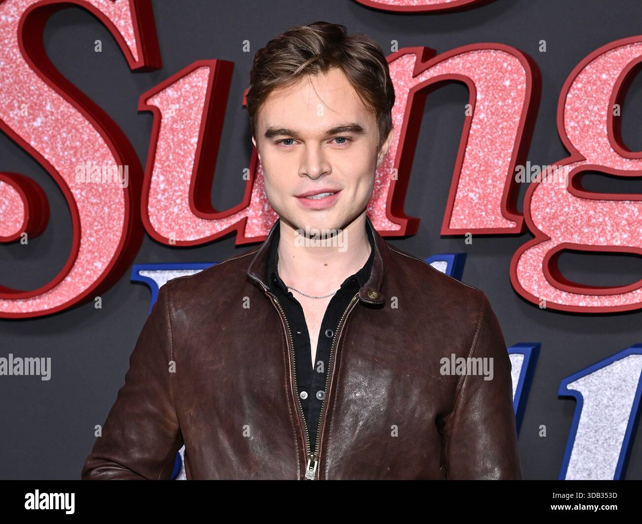 John Beckwith attends the premiere of "Song Sung Blue" at AMC Lincoln ...