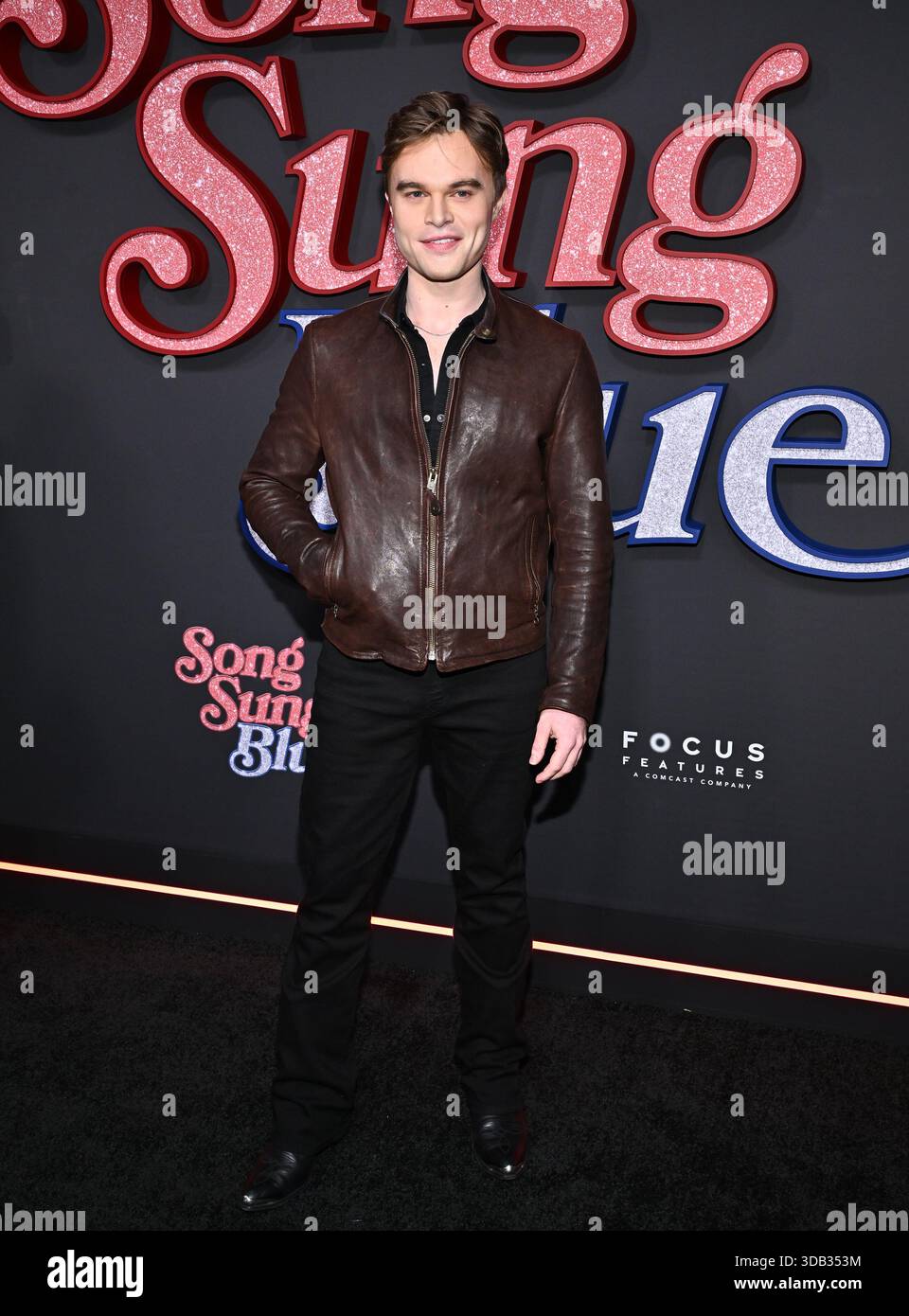 John Beckwith attends the premiere of "Song Sung Blue" at AMC Lincoln ...