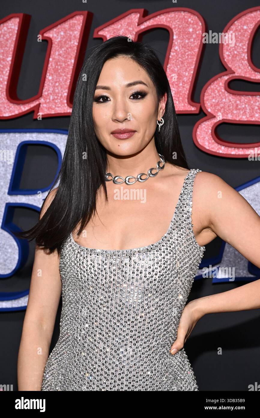 Constance Wu attends the premiere of "Song Sung Blue" at AMC Lincoln ...