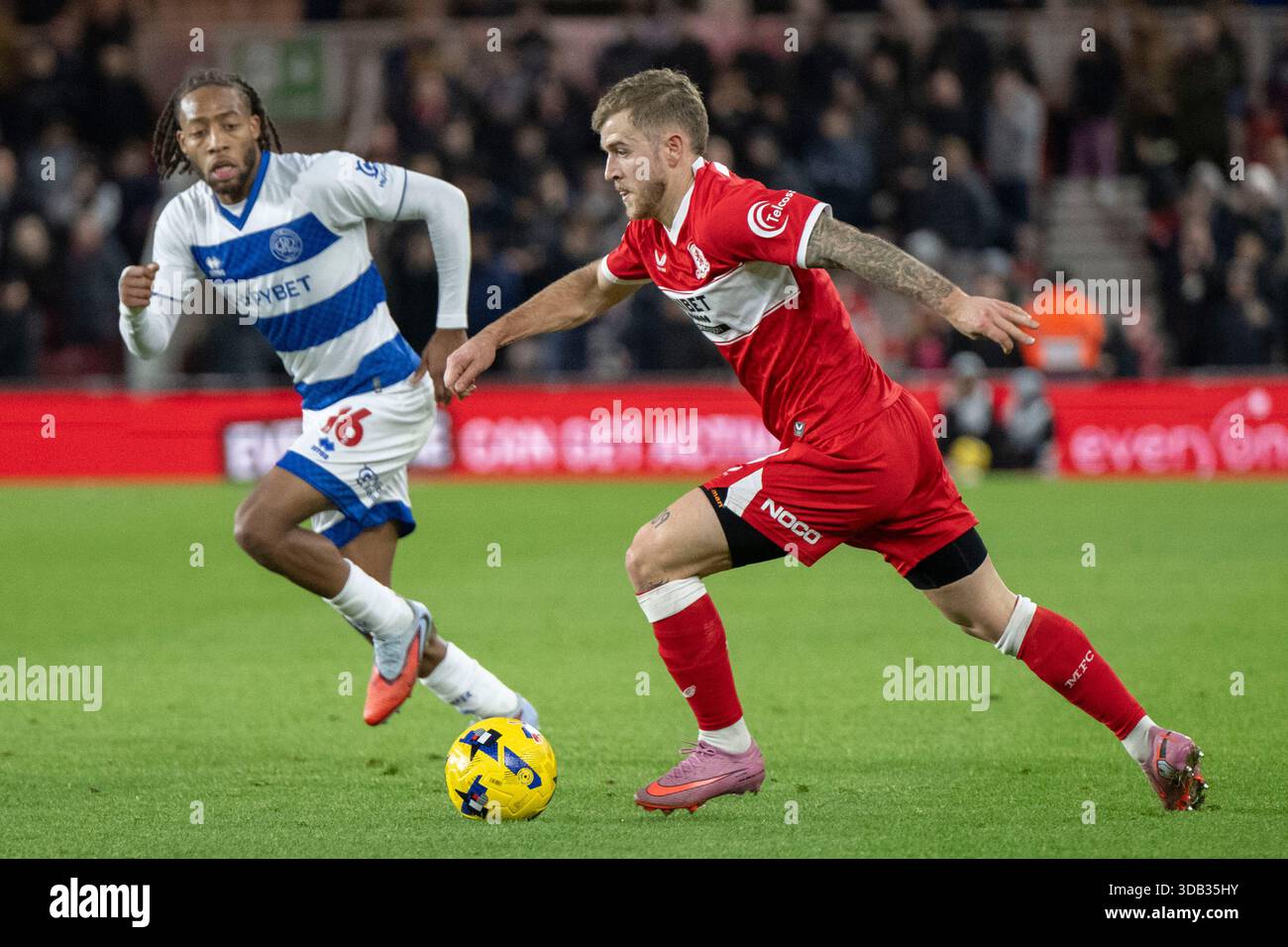Riley McGree of Middlesbrough drives forward with the ball during the ...