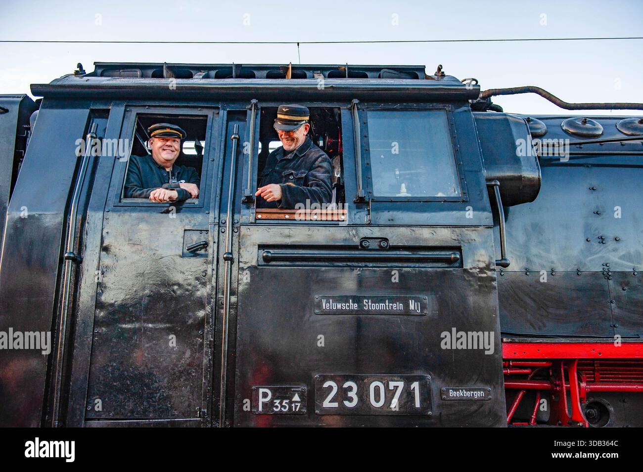 December 13, 2025, Nijmegen, Netherlands: Two train drivers are waiting ...