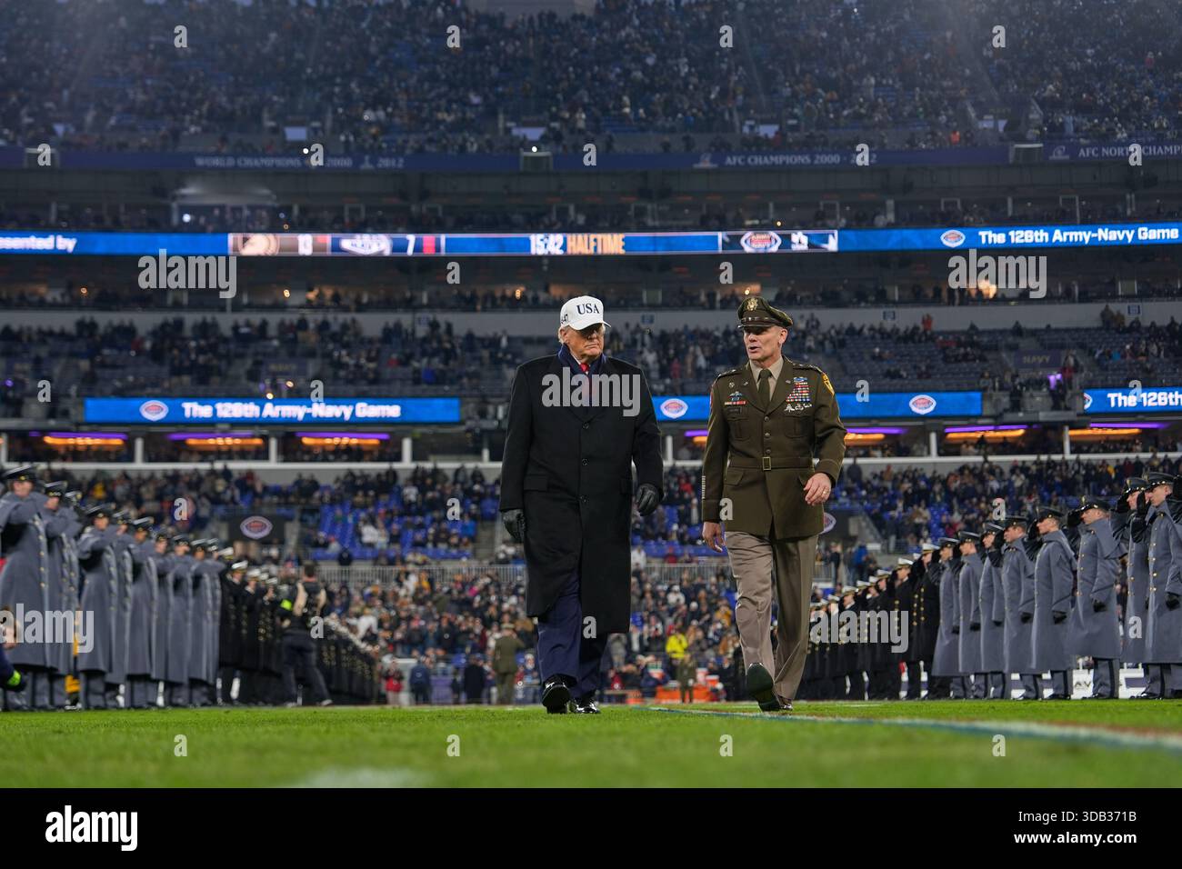 President Donald Trump walks from the Navy to the Army side of the ...