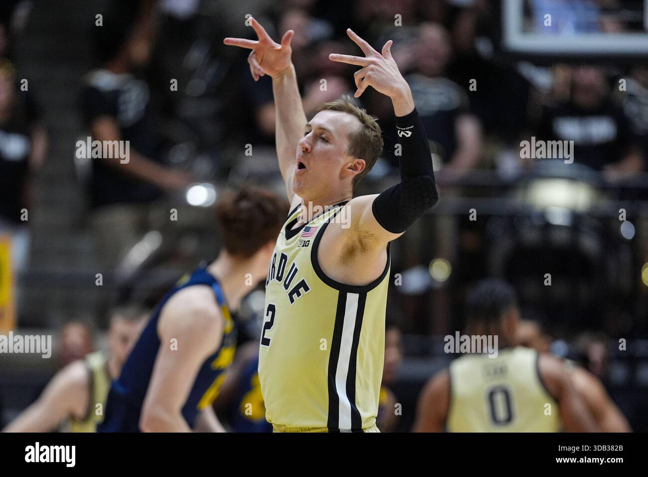 Purdue guard Fletcher Loyer (2) celebrates after a three-point basket ...