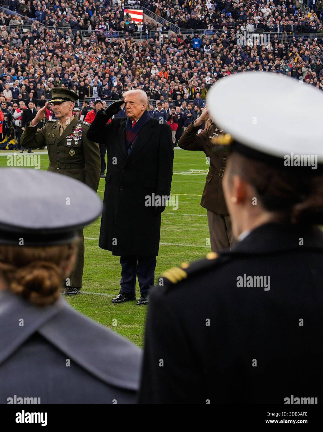 President Donald Trump salutes with Lt. Gen. Steven Gilland ...