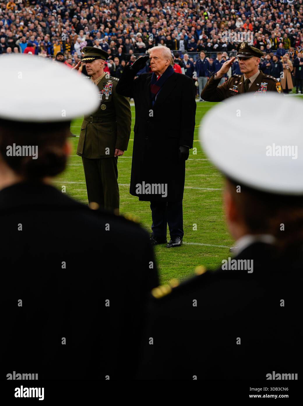 President Donald Trump salutes with Lt. Gen. Steven Gilland ...