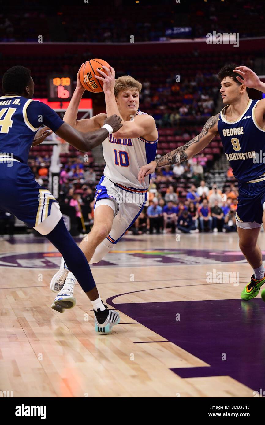Florida Forward Thomas Haugh (10) drives through the lane during the ...