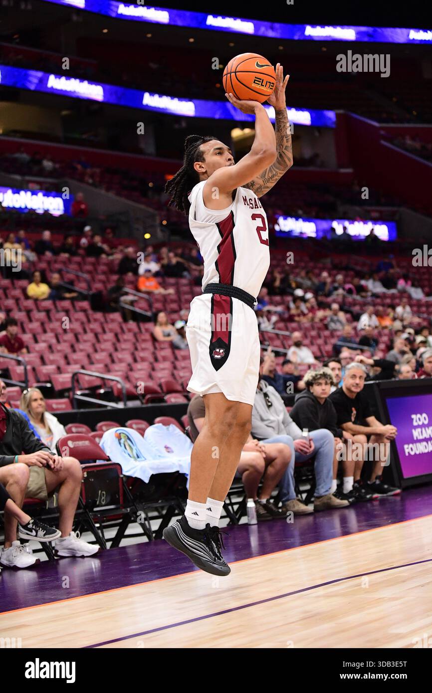 UMass Guard Marcus Banks Jr (24) attempts the three point shot during ...
