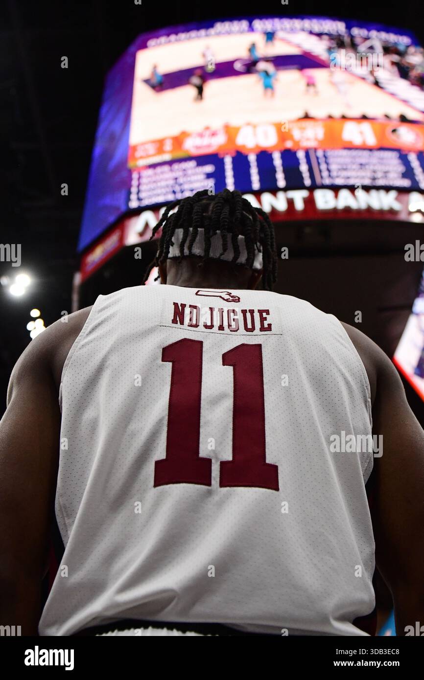 UMass Guard Jayden Ndjique (11) waits to throw the ball in during the ...