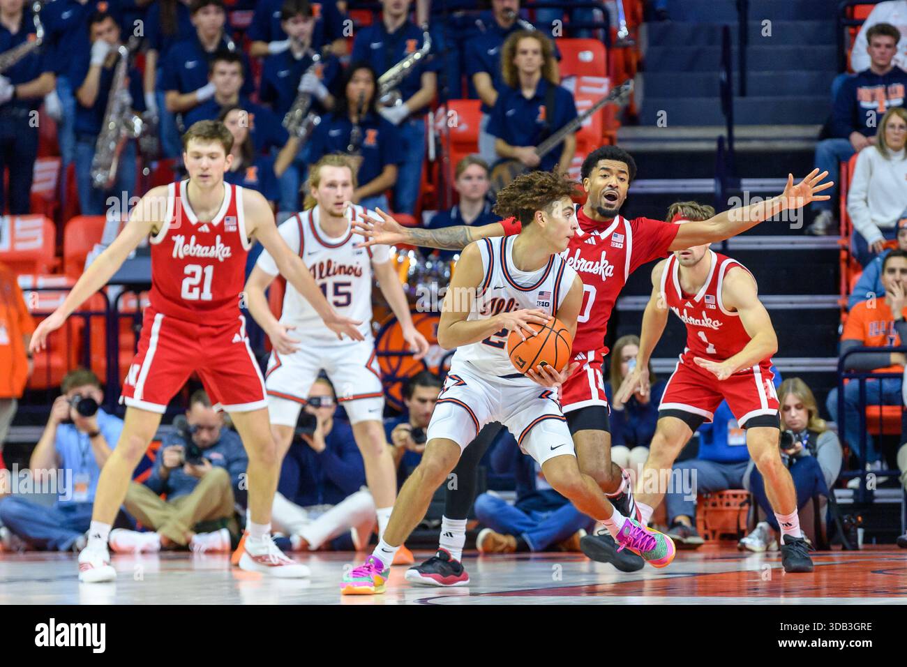 Illinois' Andrej Stojakovic looks for an outlet in front of Pryce ...