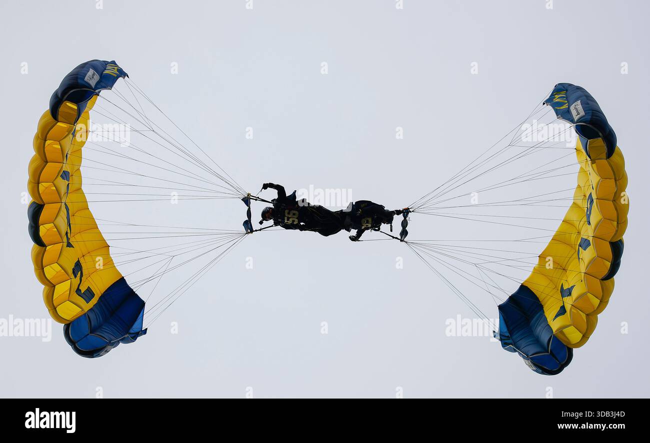 December 13, 2025: The US Navy Leap Frogs perform above the stadium ...