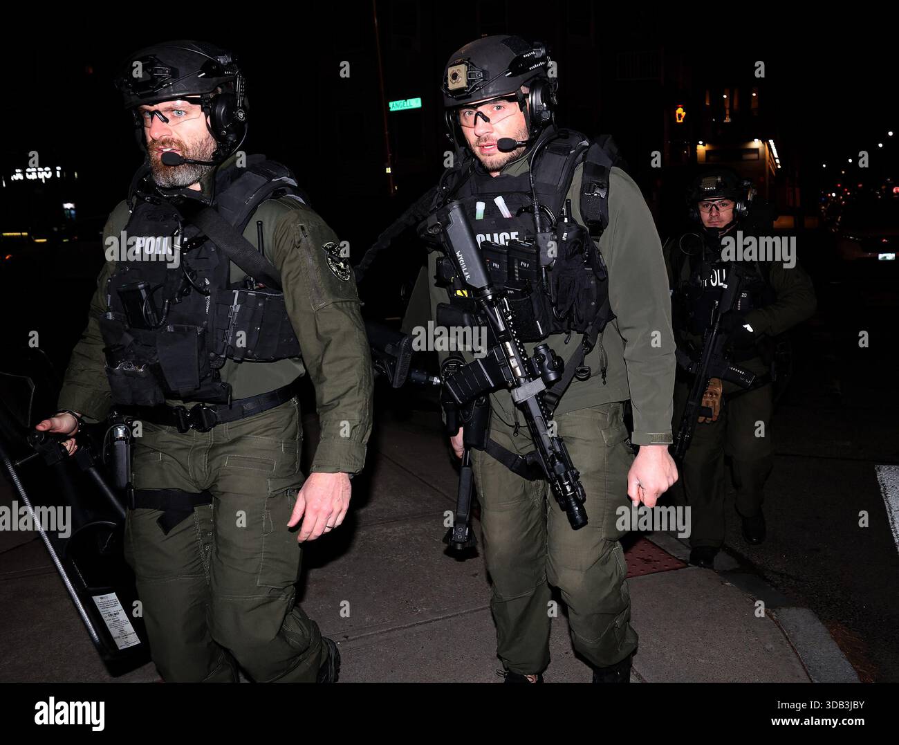 Police arrive at the scene in Providence, R.I., on Saturday, Dec. 13 ...