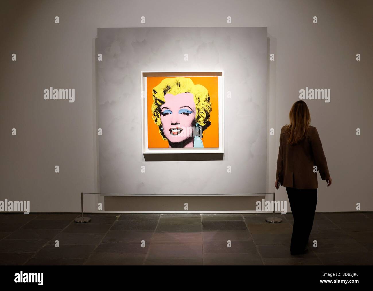 Andy Warhol's Shot Orange Marilyn (1964) is on display at a preview of ...