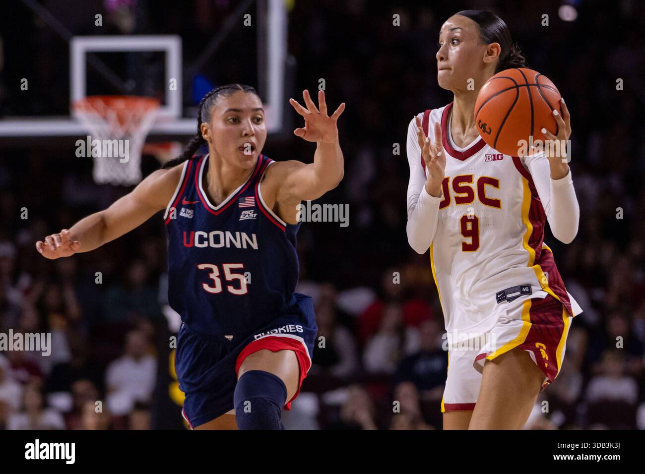 UConn guard Azzi Fudd (35) defends Southern California guard Jazzy ...