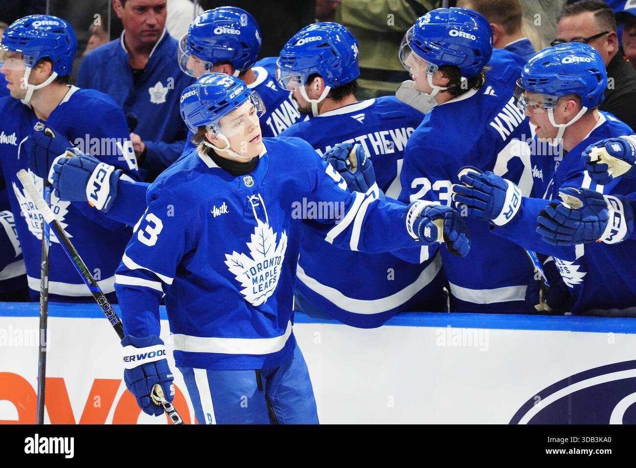 Toronto Maple Leafs' Easton Cowan, center, celebrates his goal against ...