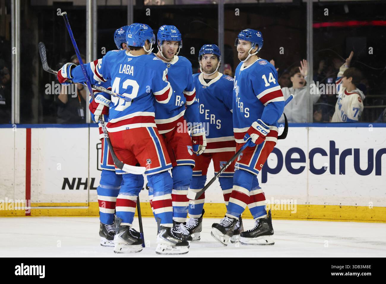 New York Rangers players celebrate a Noah Laba (42) goal in the first ...