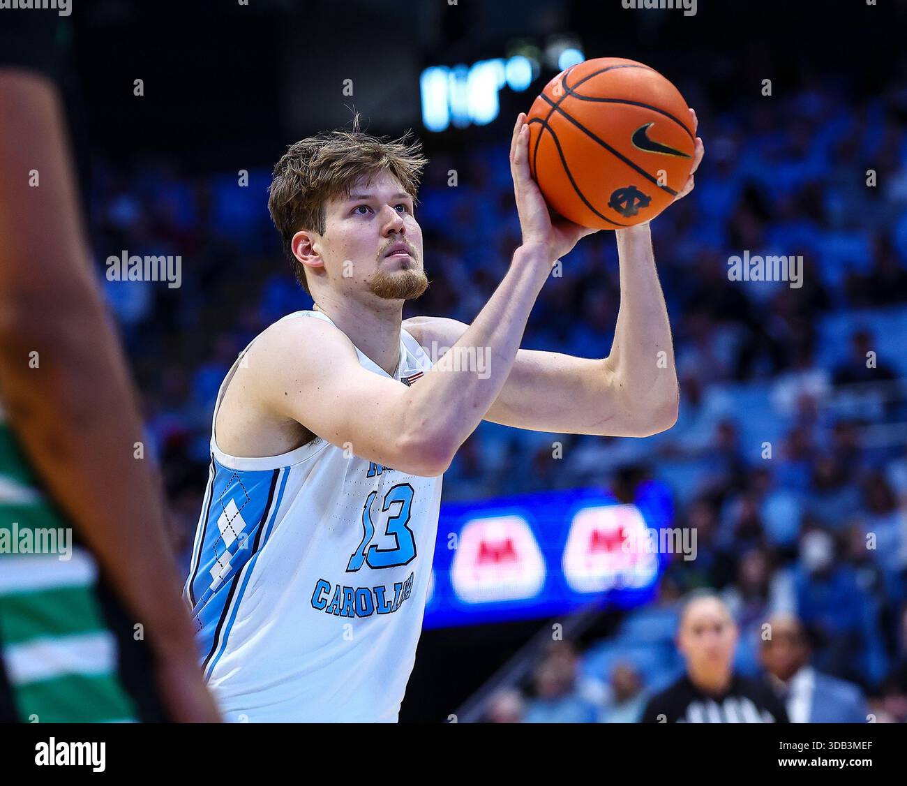 December 13, 2025: North Carolina center Henri Veesaar (13) shoot free ...