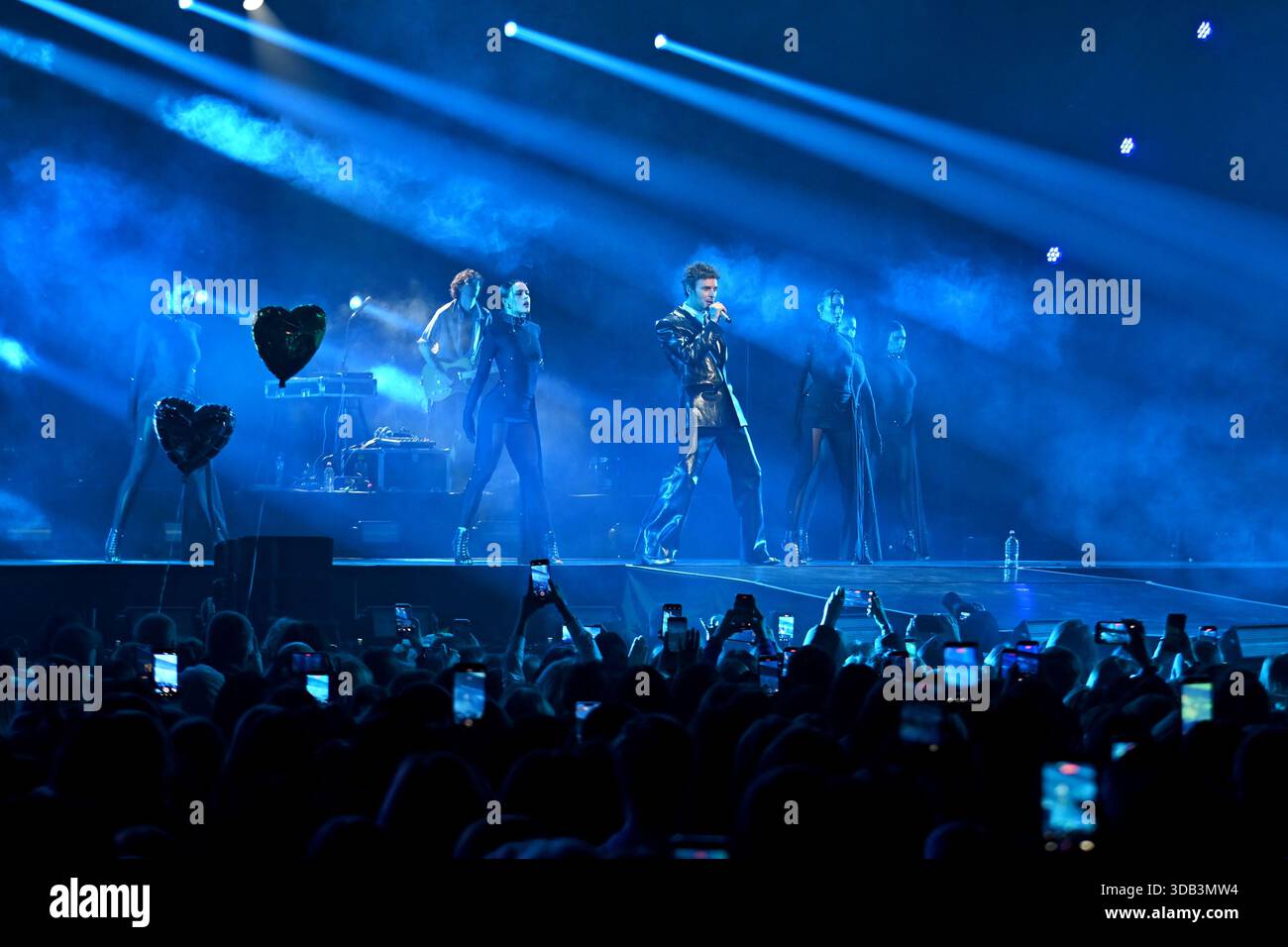 Ukrainian singer Max Barskih on stage surrounded by the audience during ...