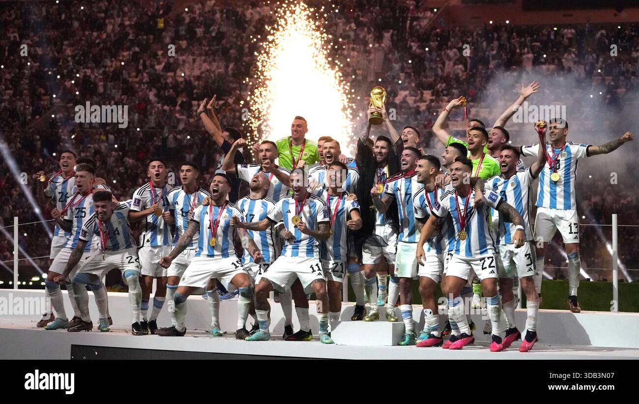 Lionel messi world cup trophy lift hi-res stock photography and images ...