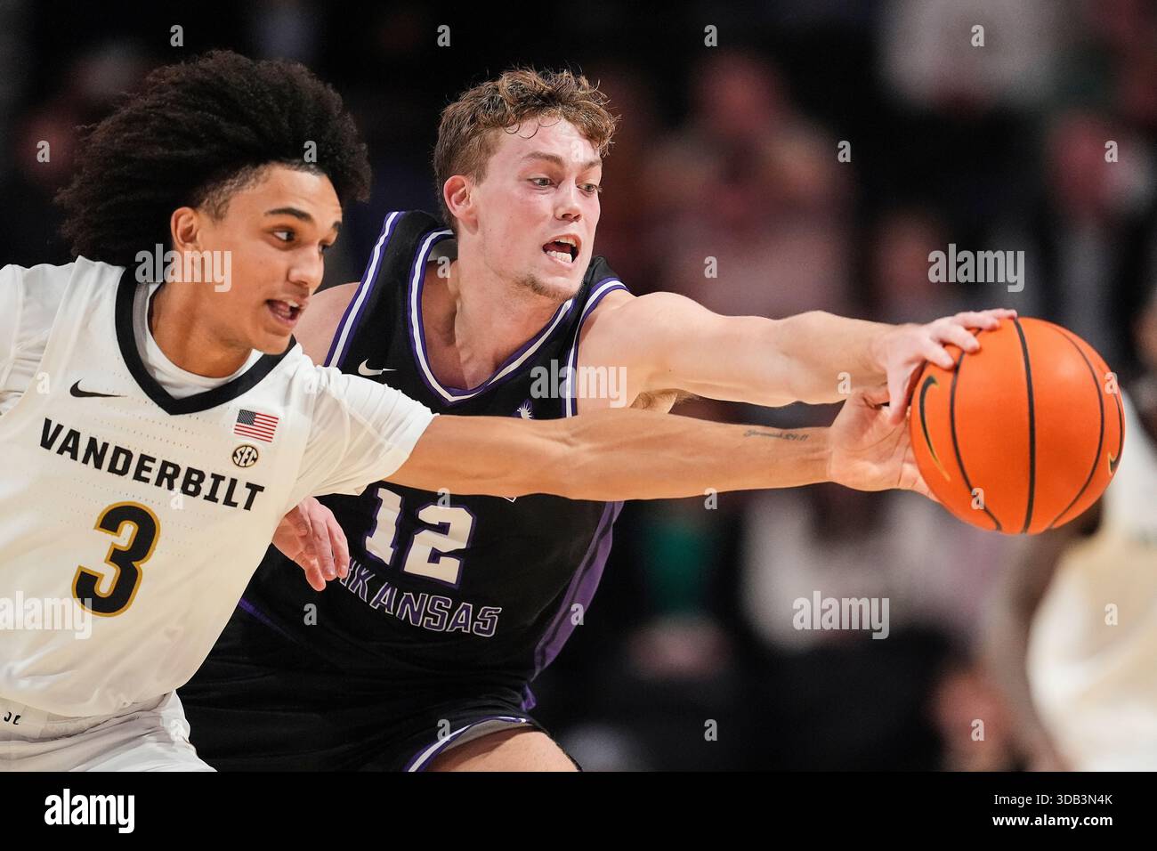 Vanderbilt guard Tyler Tanner (3) and Central Arkansas guard Ty ...