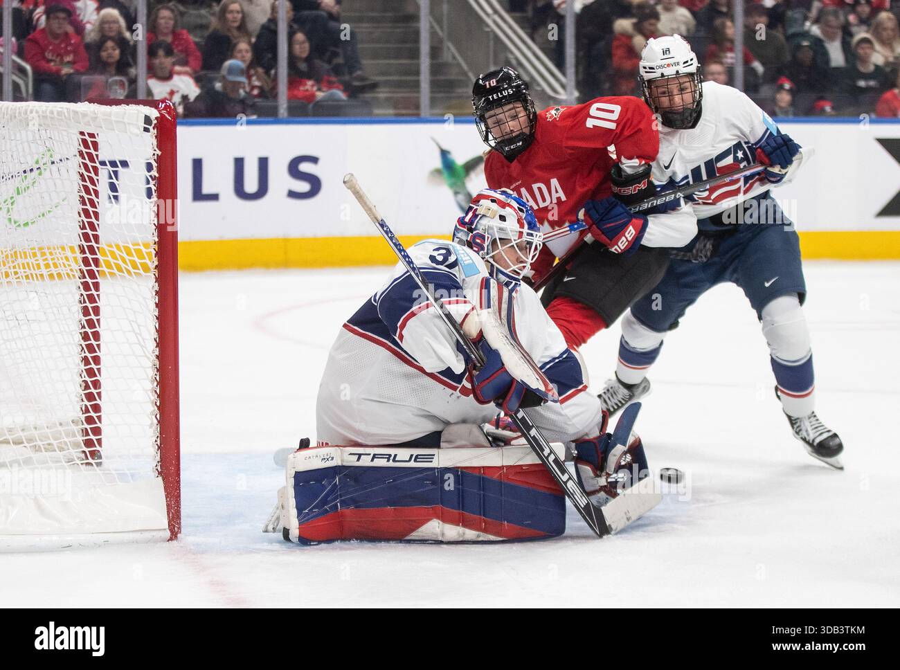 United States goalie Aerin Frankel (31) makes the save as Jesse Compher ...