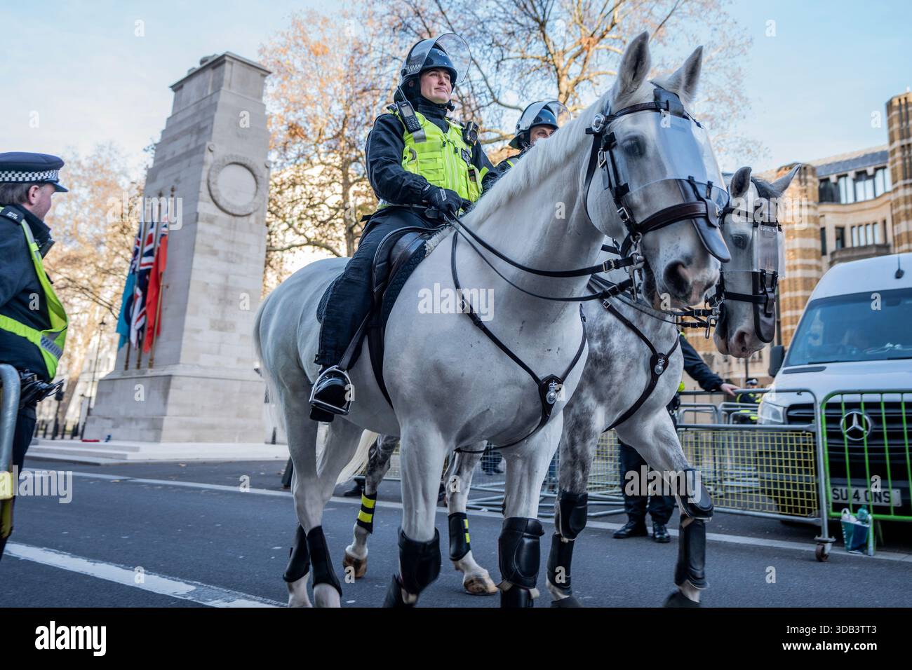 Police on horseback patrol the length of Whitehall which was closed to ...
