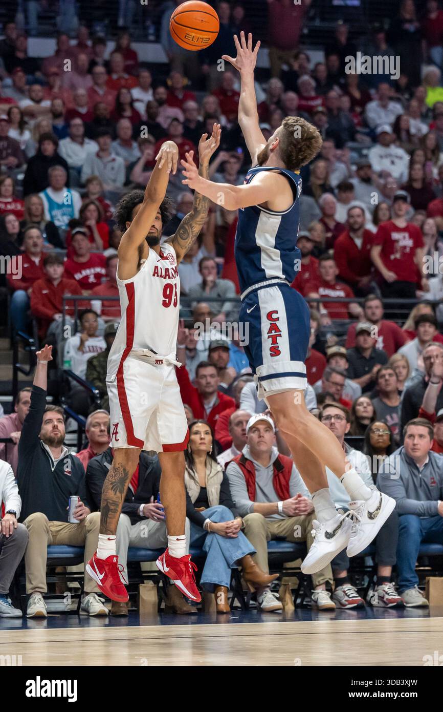 Alabama guard Houston Mallette (95) shoots and hits with Arizona guard ...