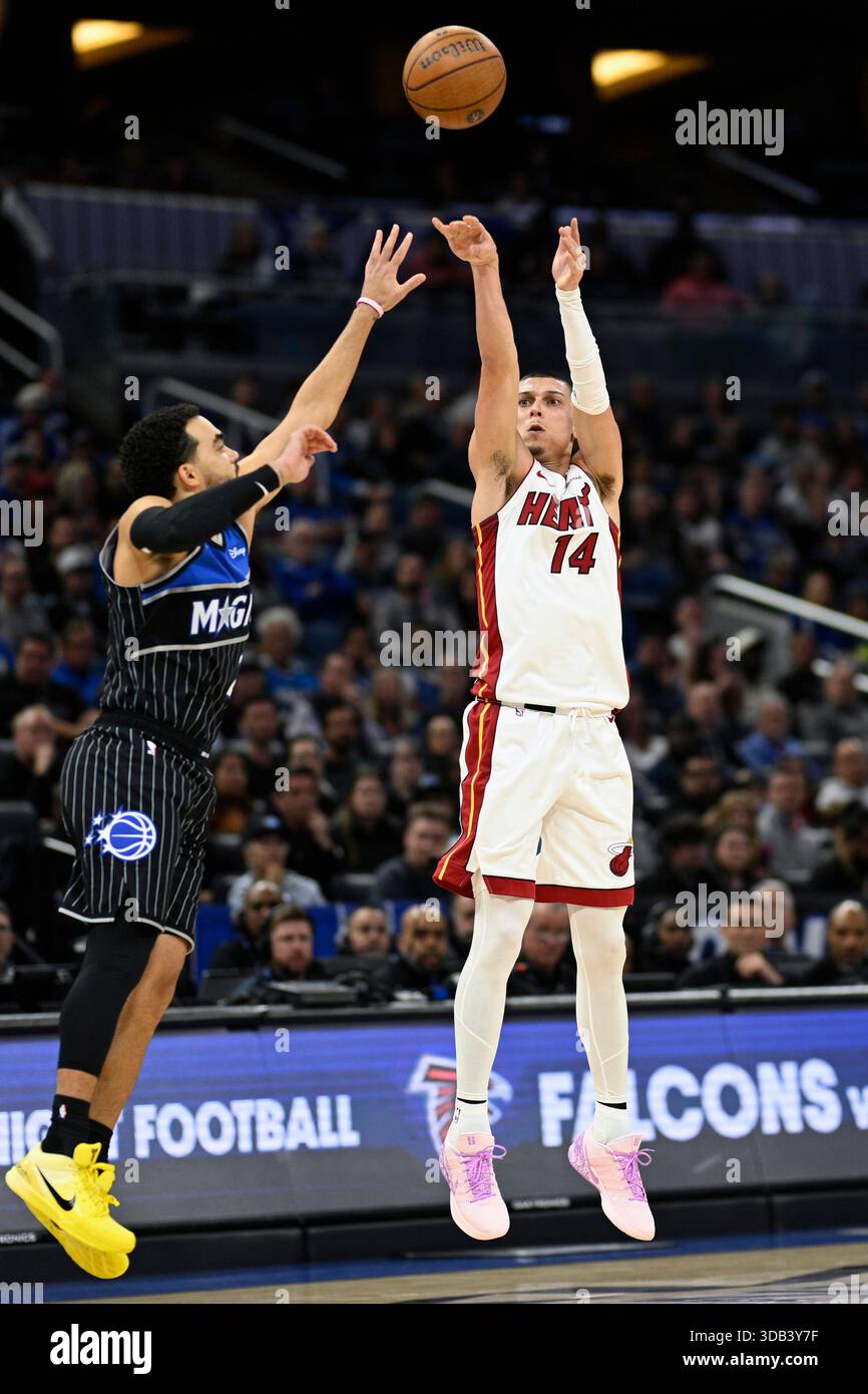 Miami Heat guard Tyler Herro (14) shoots in front of Orlando Magic ...
