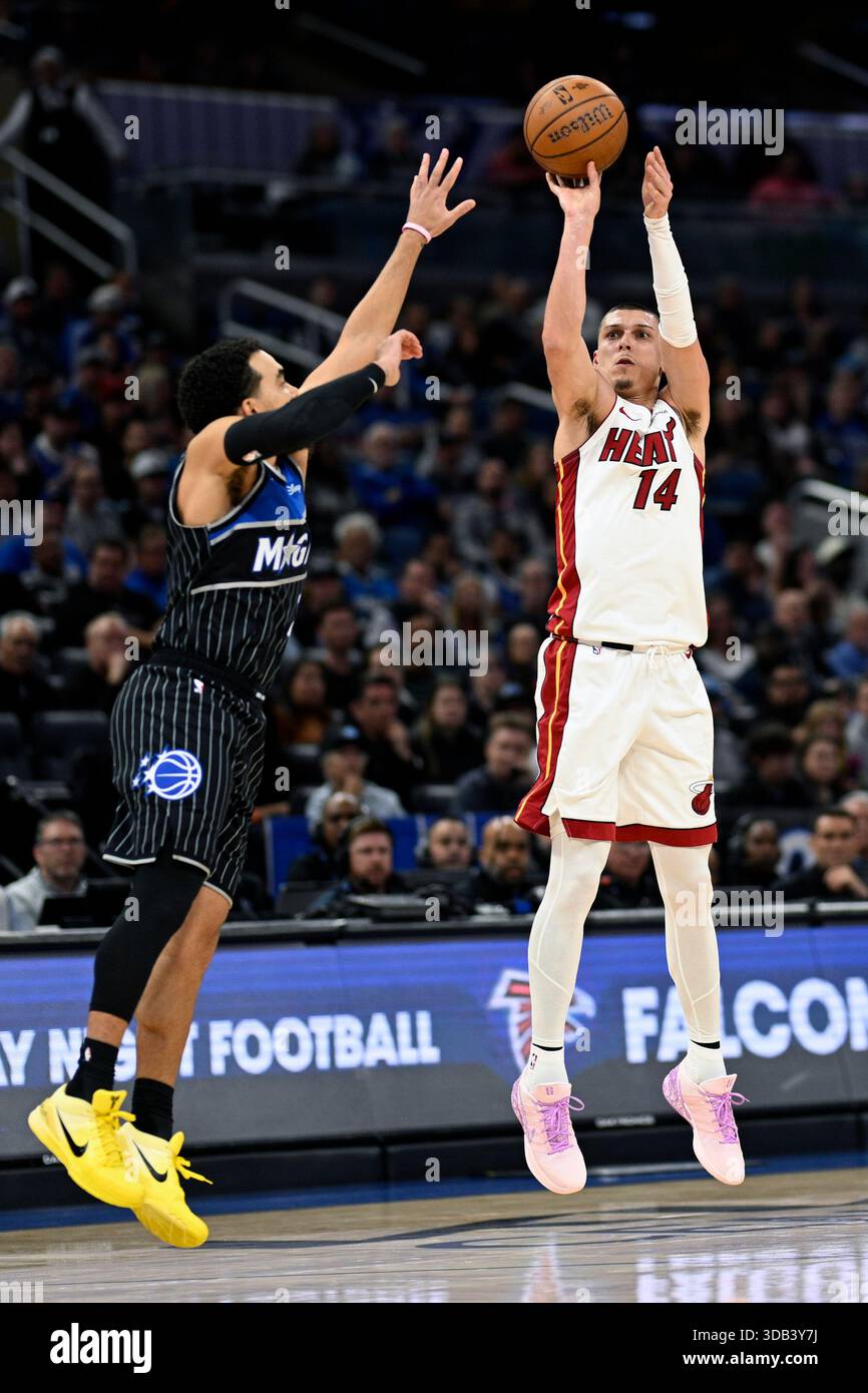 Miami Heat guard Tyler Herro (14) shoots in front of Orlando Magic ...