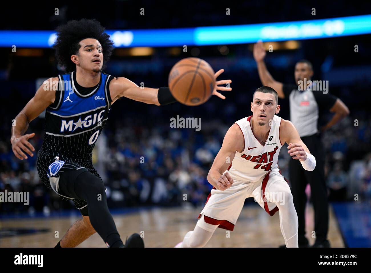 Miami Heat guard Tyler Herro (14) looks on as Orlando Magic guard ...