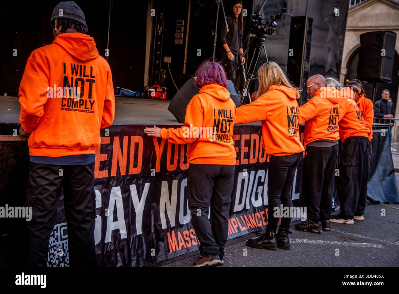 Protestors assemble a large banner during the "Say No To Digital ID ...
