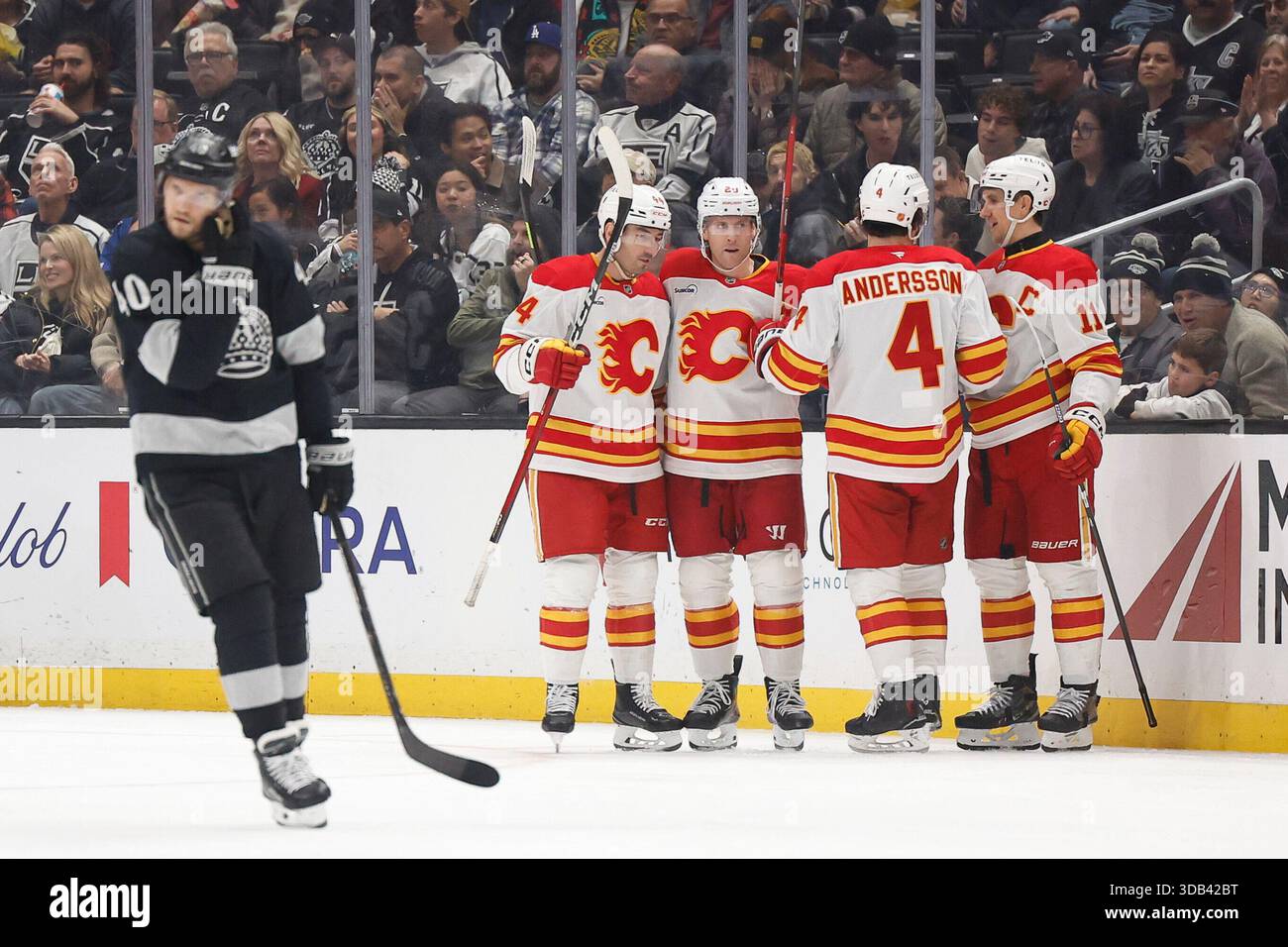 Calgary Flames left wing Blake Coleman (20) is greeted by teammates ...