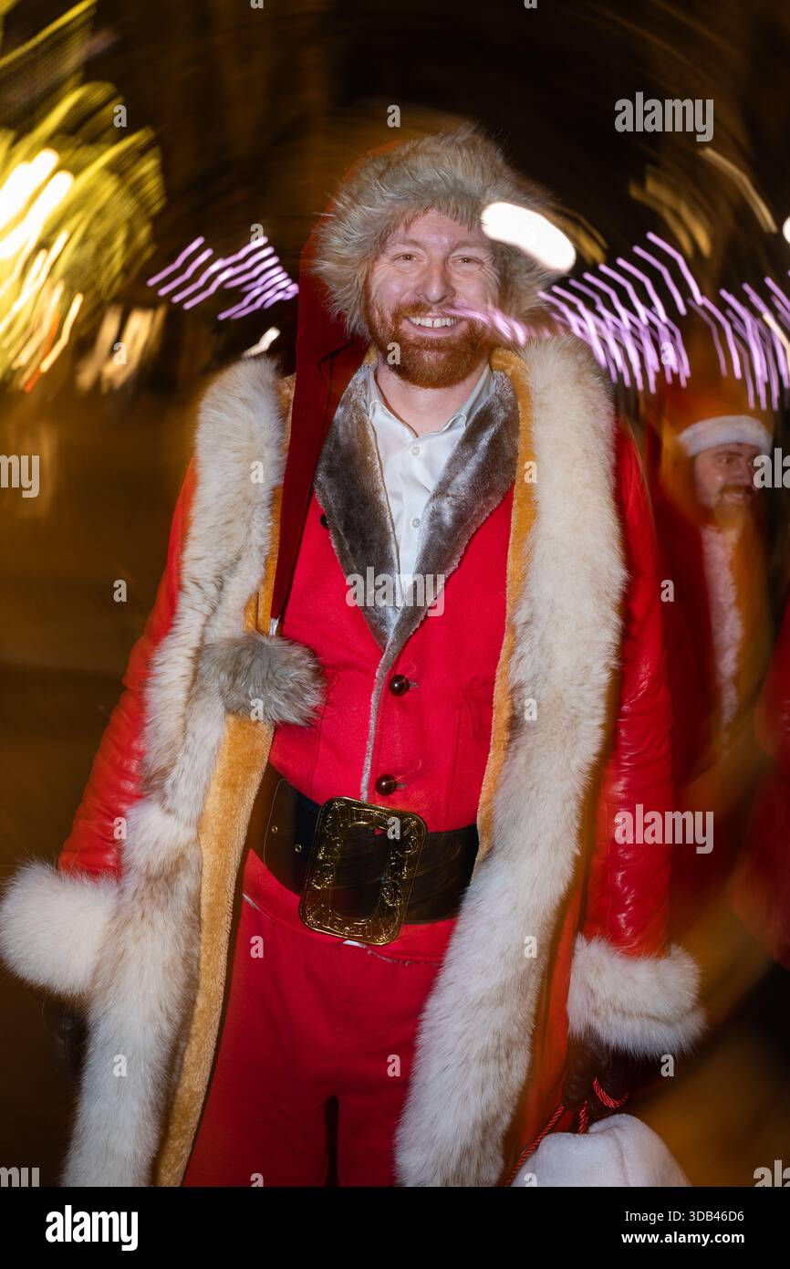 Seattle, USA. 13 Dec, 2025. Participants at the annual Santacon event ...