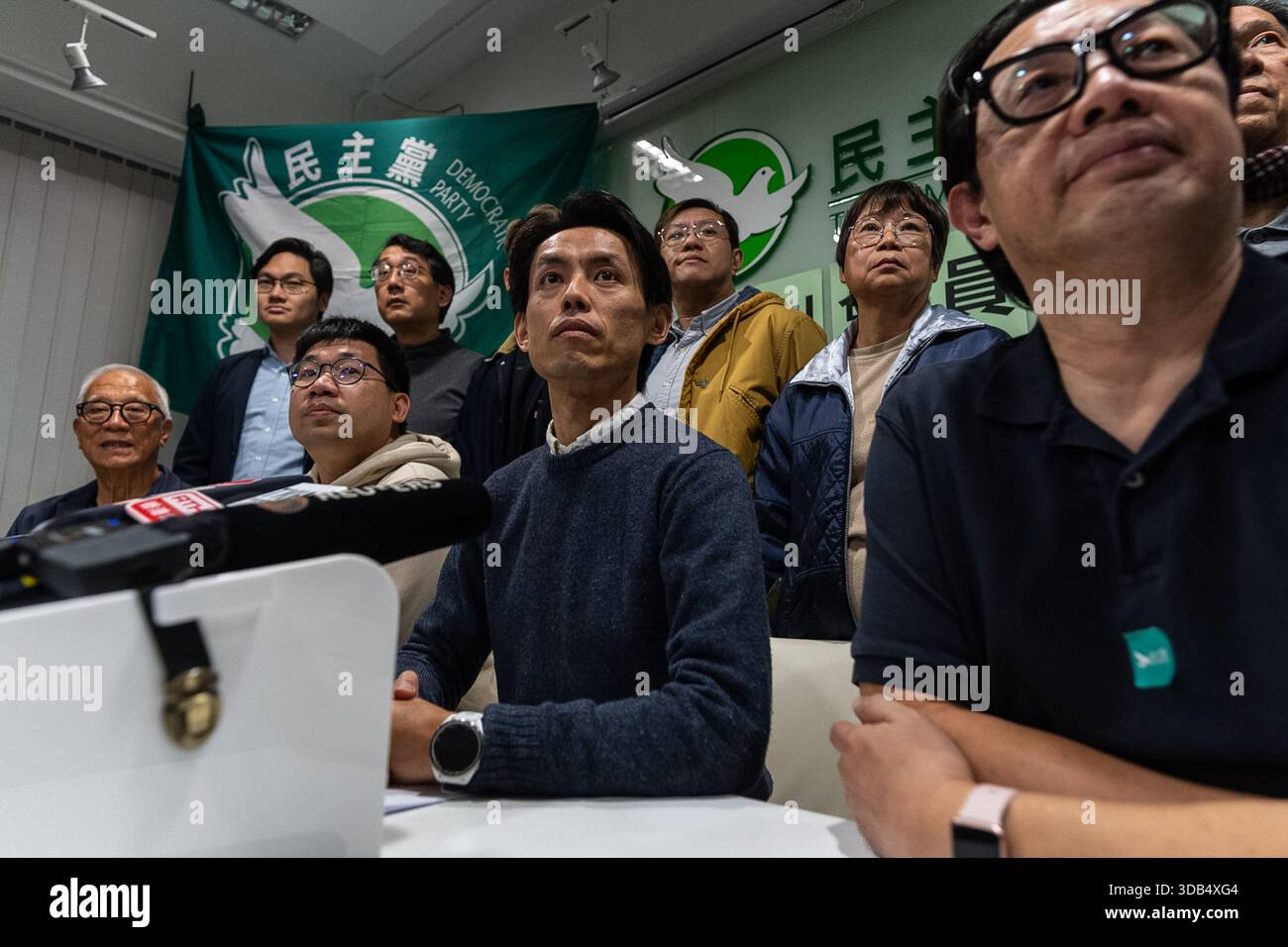 Lo Kin-hei, chairman of Hong Kong's Democratic Party, center, and other ...