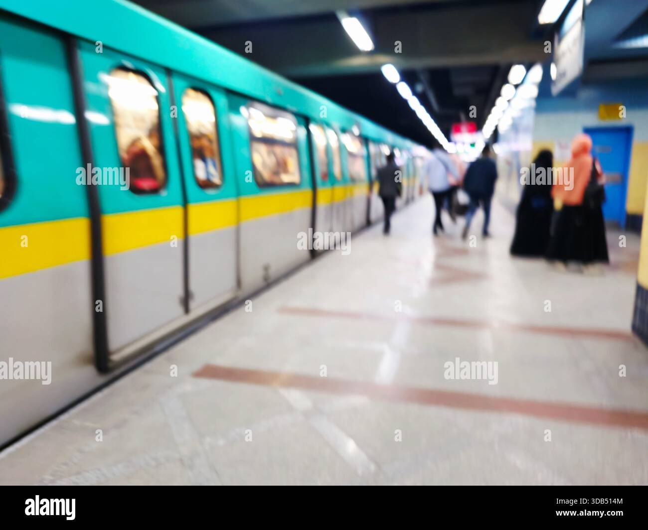 a blurry unclear photo of Cairo metro platform, The Cairo Metro is ...