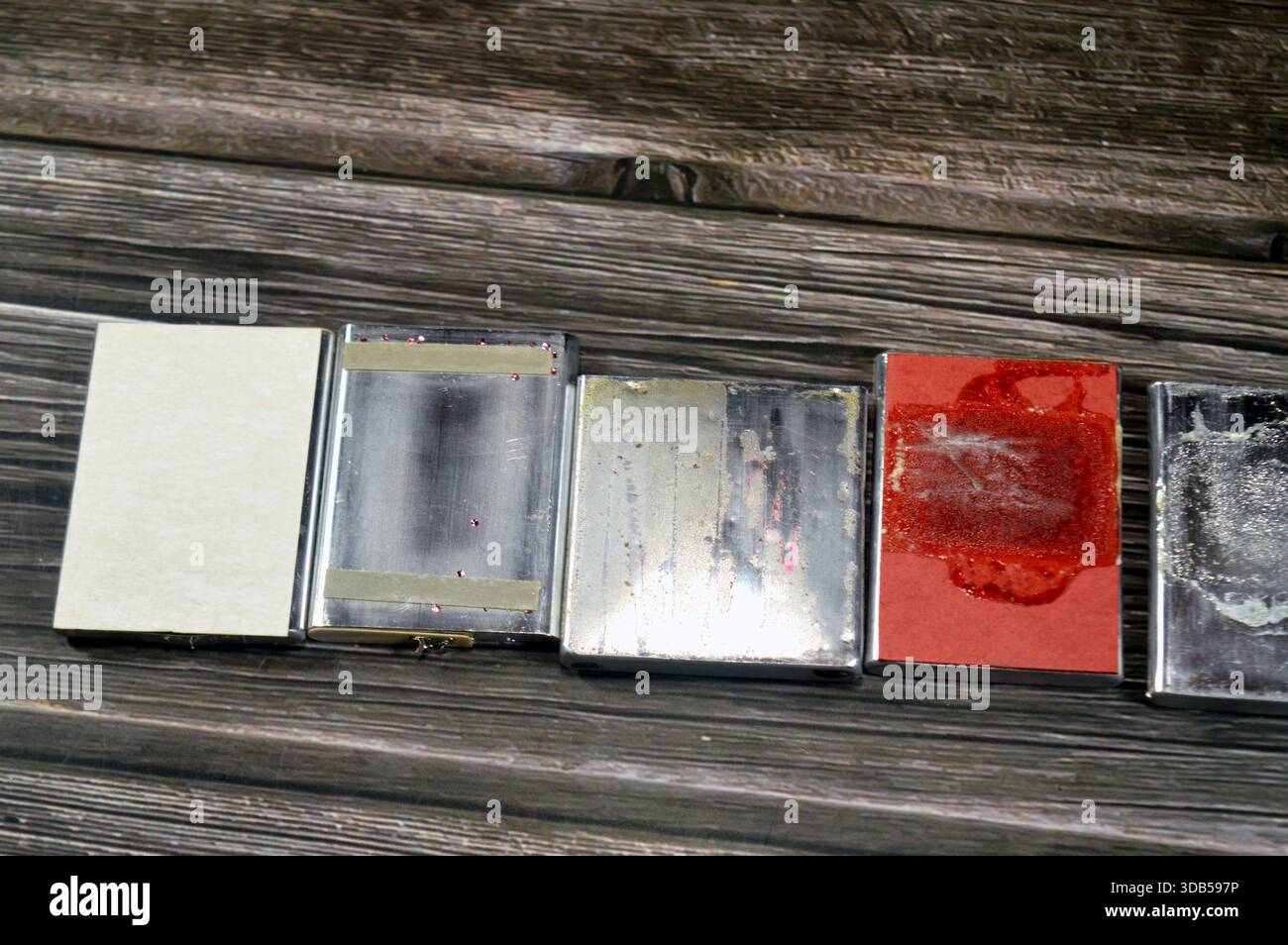 Piles of Bloated lithium ion batteries, possibly damaged by faulty ...