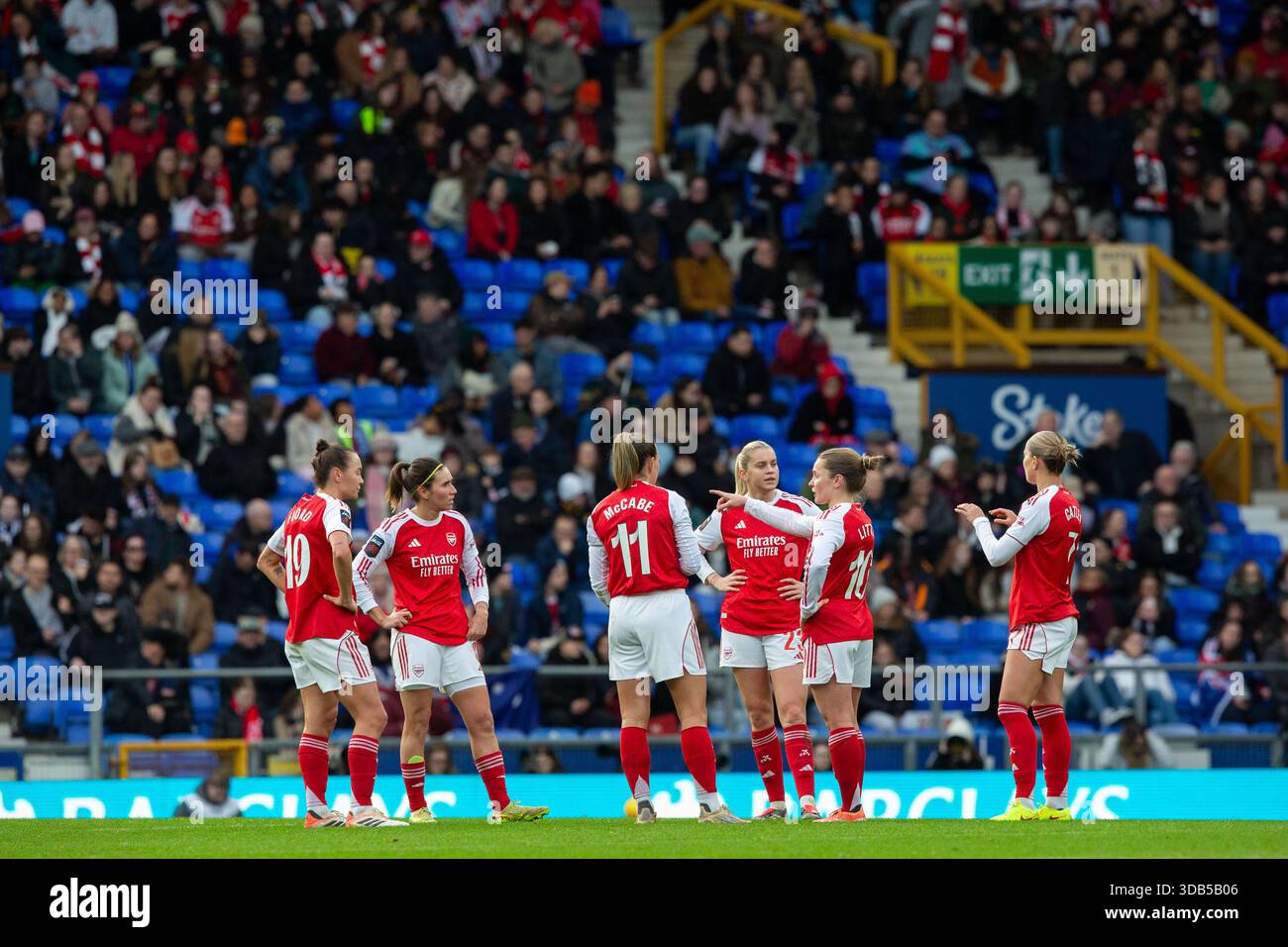 Arsenal players discuss tactics during a break in play. Everton Women v ...
