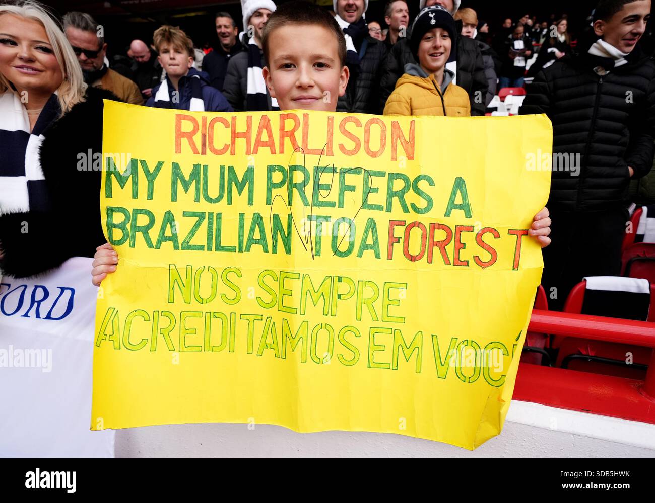 A Tottenham Hotspur fan with a sign in support of Richarlison ahead of ...