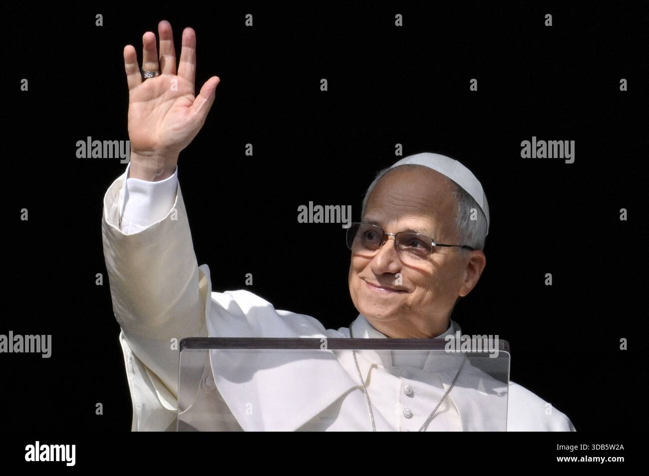 Pope Leo XIV leads the Angelus prayer from the window of the Apostolic ...