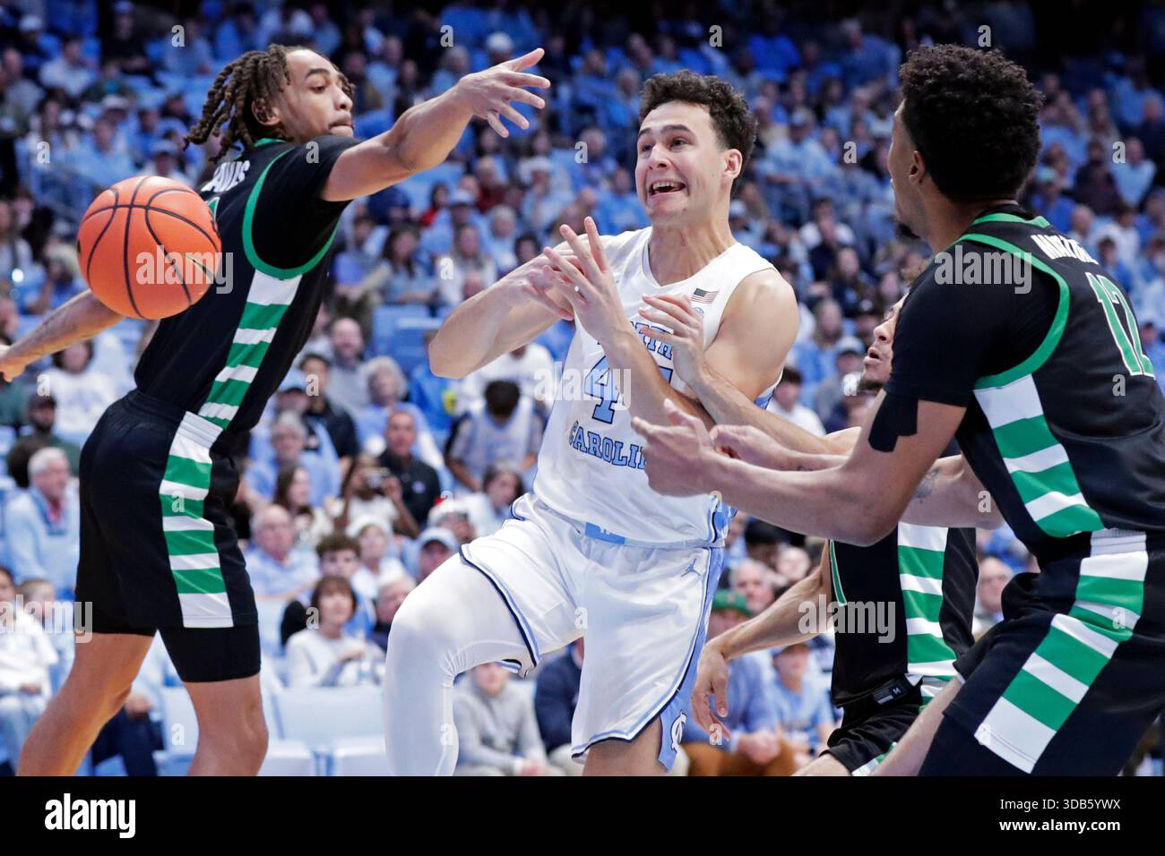 North Carolina guard Luka Bogavac (44) loses the handle on the ball as ...