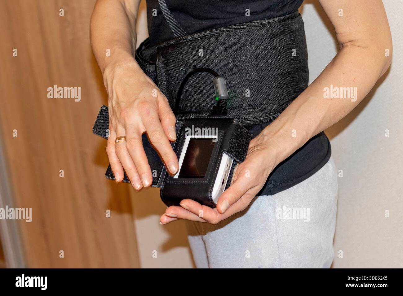 Patient wearing recording device of capsule endoscopy procedure Stock ...