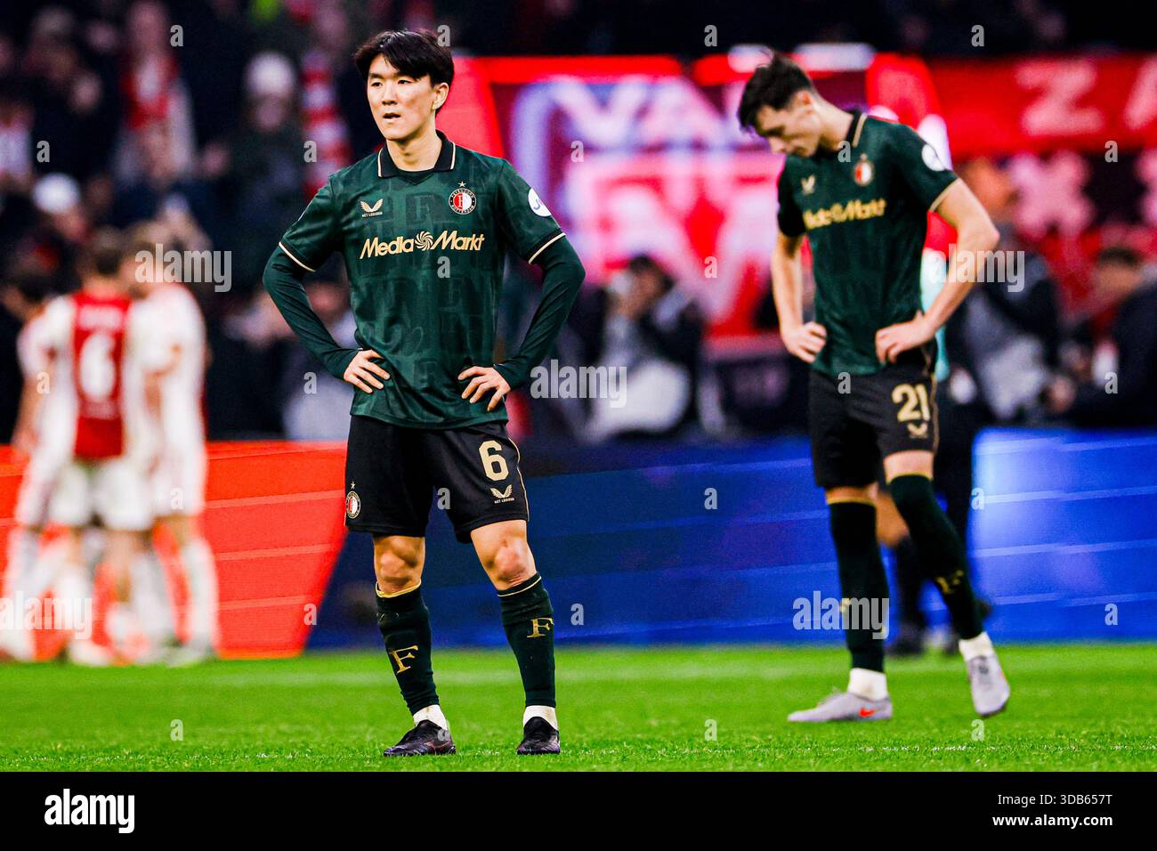 Inbeom Hwang of Feyenoord Rotterdam looks dejected after conceding his ...