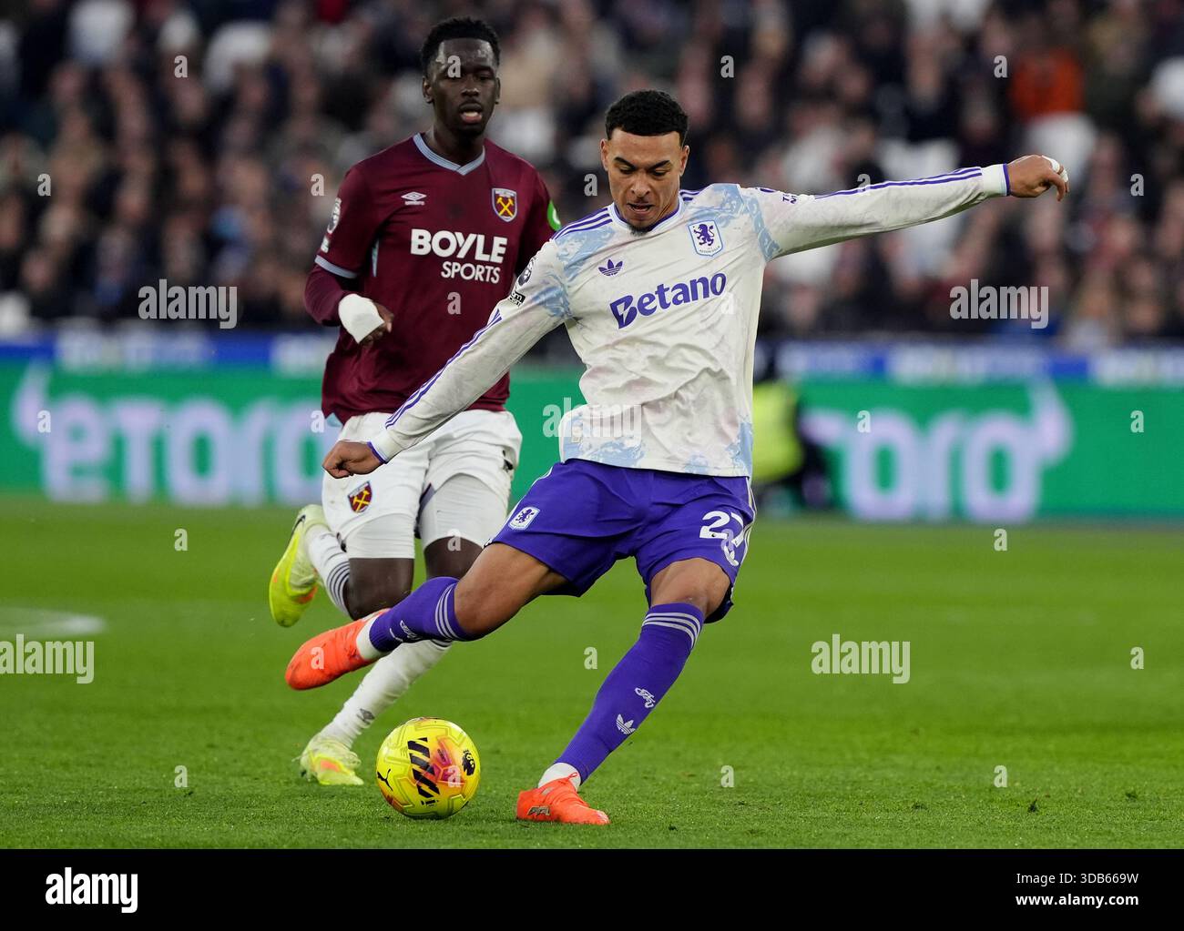 Aston Villa's Morgan Rogers scores his sides third goal during the ...