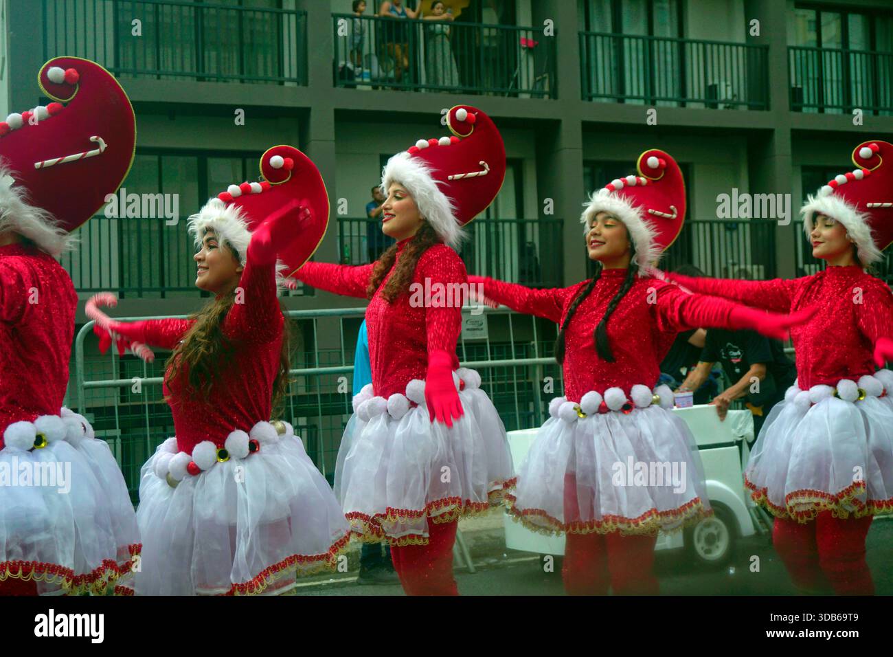 People gather to watch a Christmas parade in Sao Paulo, Brazil, 13 ...