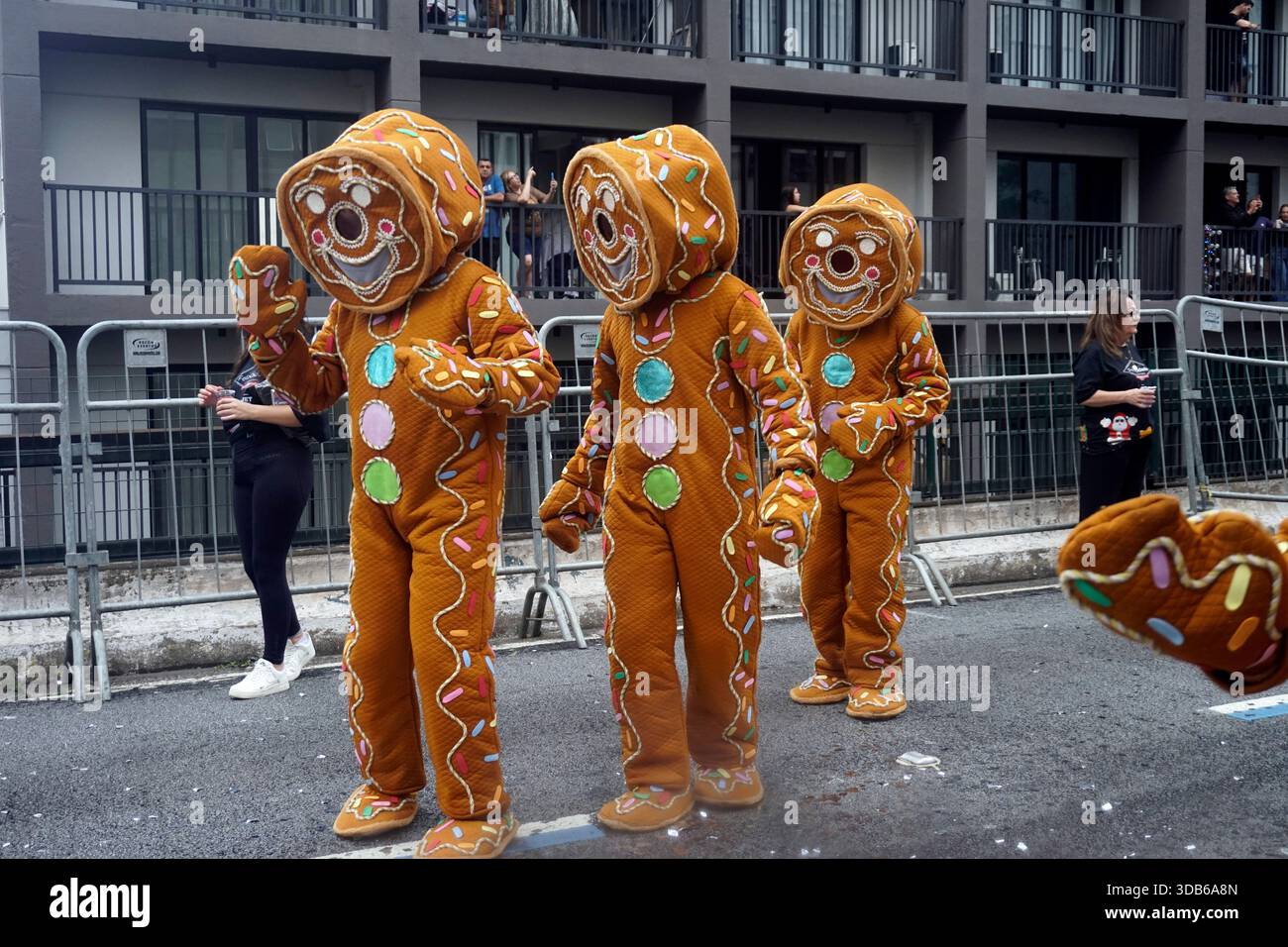 People gather to watch a Christmas parade in Sao Paulo, Brazil, 13 ...