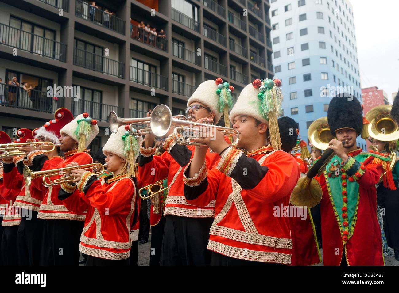 People gather to watch a Christmas parade in Sao Paulo, Brazil, 13 ...