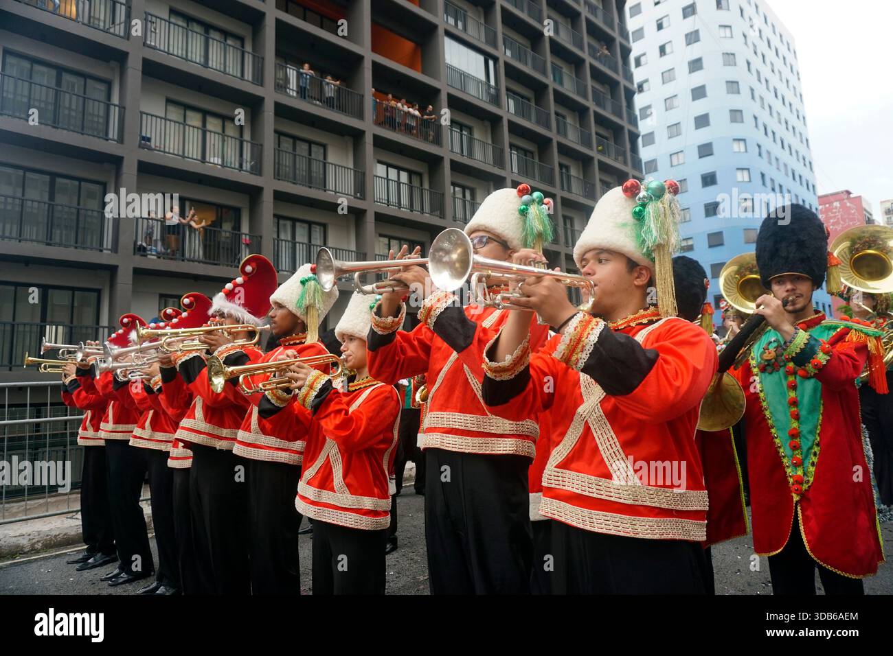 People gather to watch a Christmas parade in Sao Paulo, Brazil, 13 ...